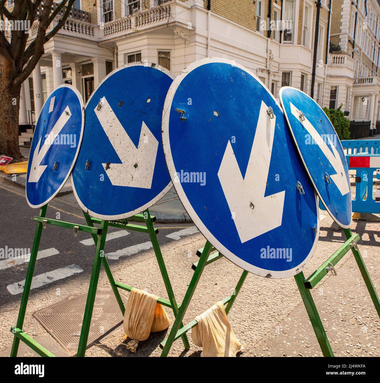 Collection of Keep Left signs on building site in West London Stock ...