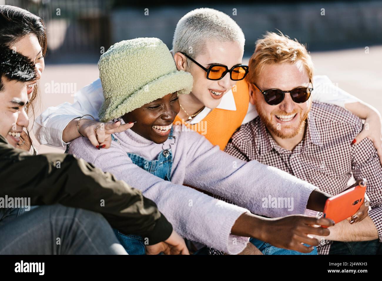 Mobile multiracial hi-res stock photography and images - Alamy