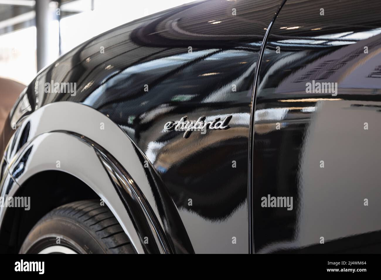 Close up view of the Hybrid sign from the electronic car with a hybrid ...
