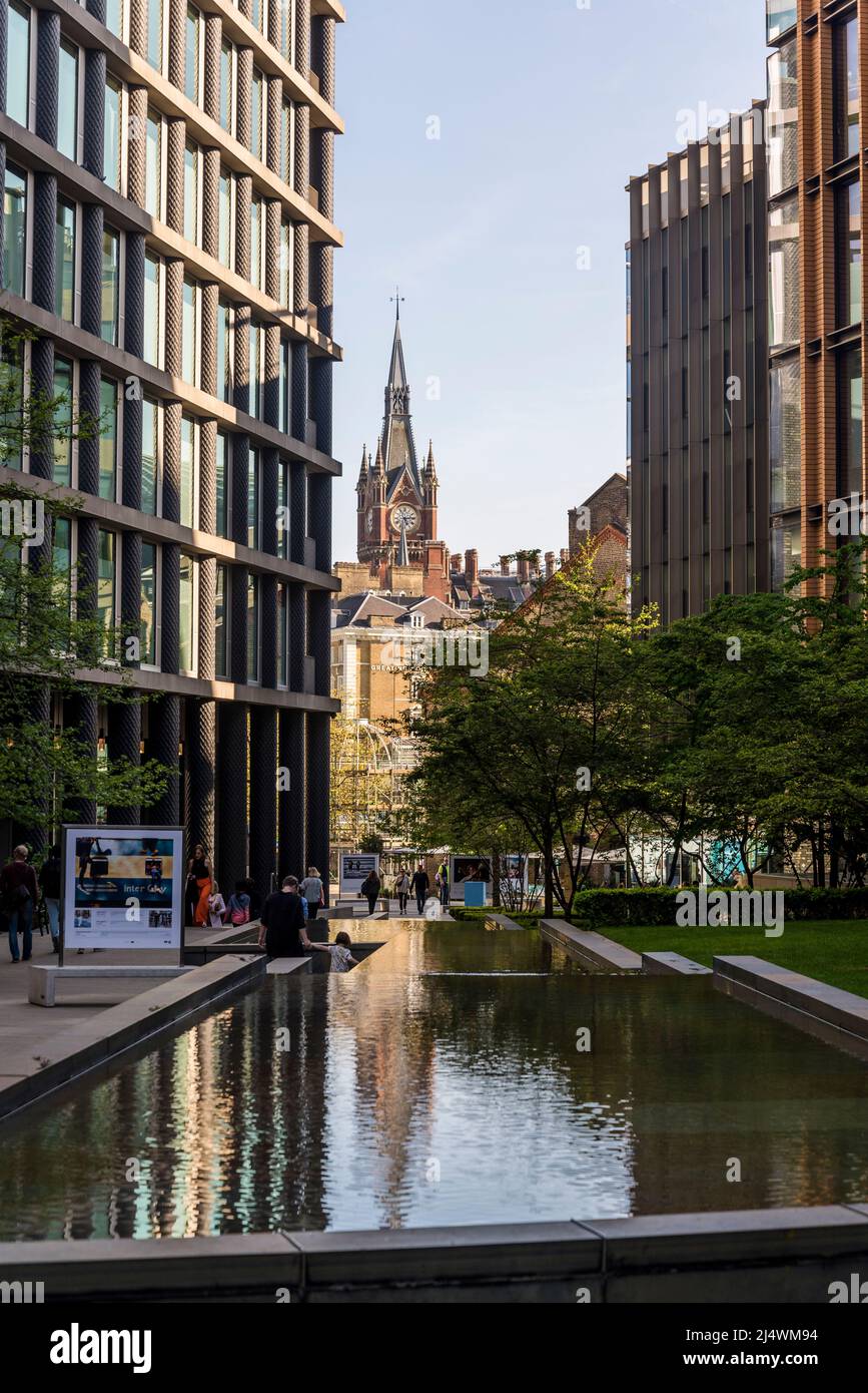 Pancras Square with water pool and the clocktower of the St Pancras ...
