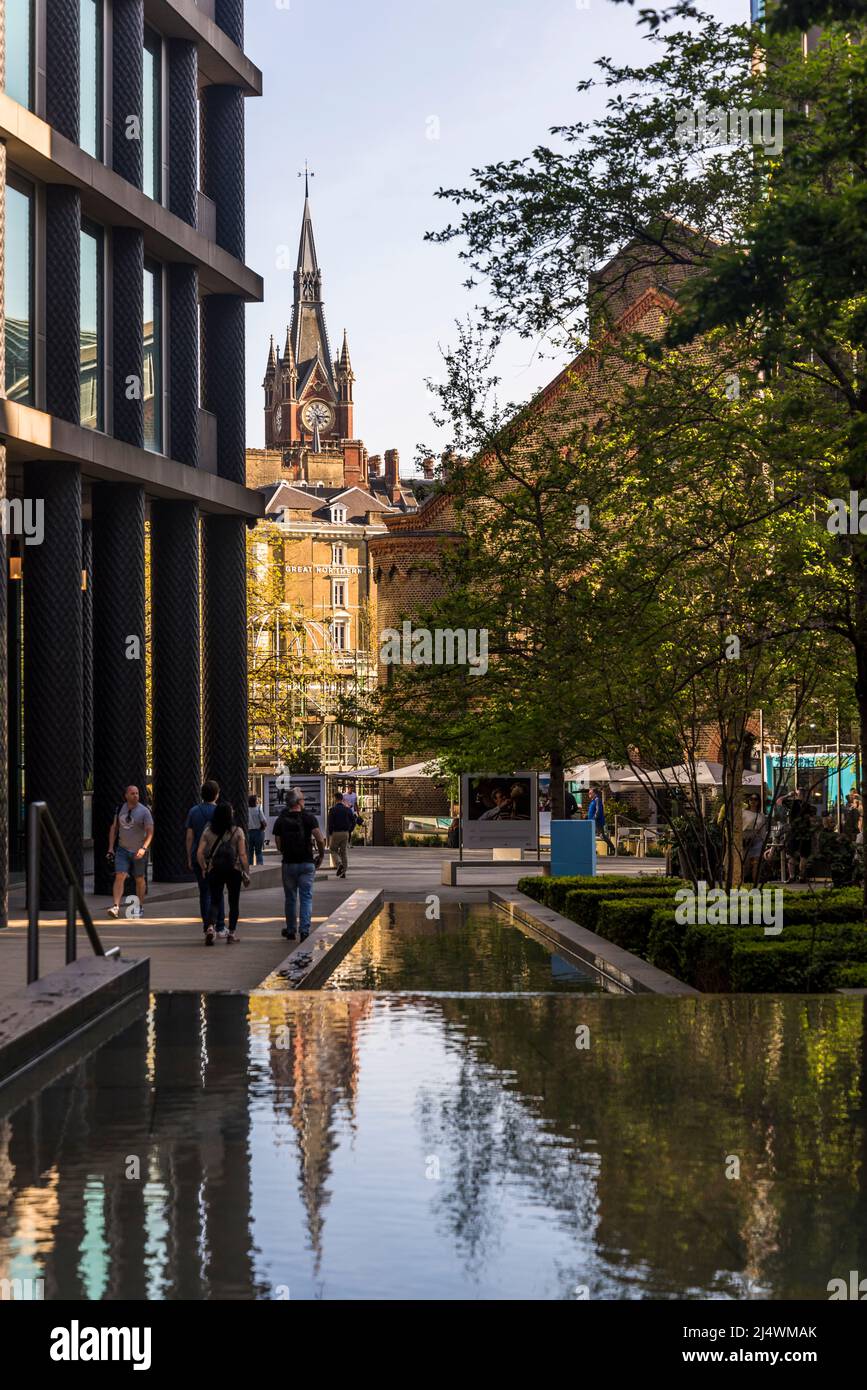 Pancras Square with water pool and the clocktower of the St Pancras ...