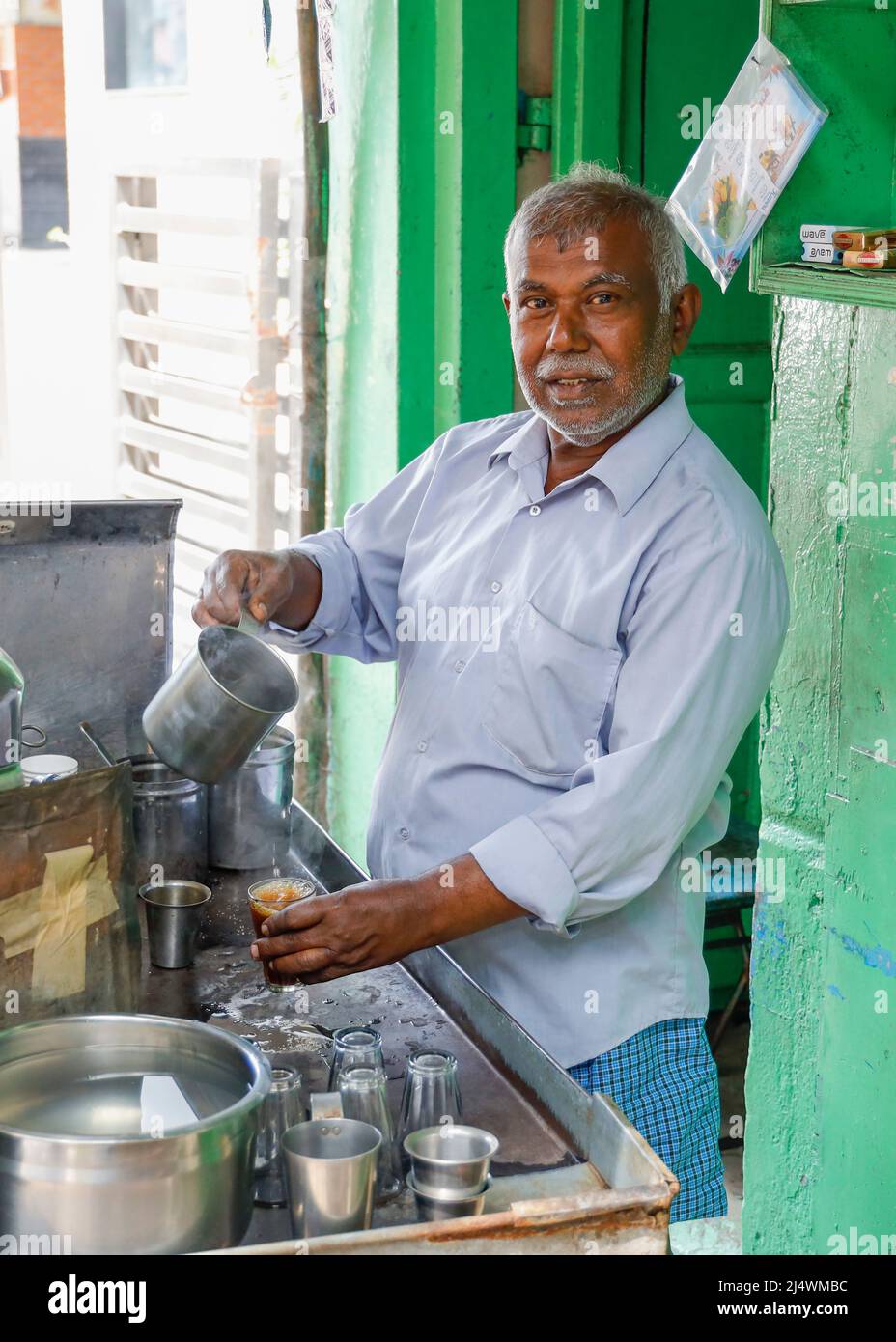 Elderly cofffee wala making coffee in Trichy, Tamil Nadu, India Stock ...