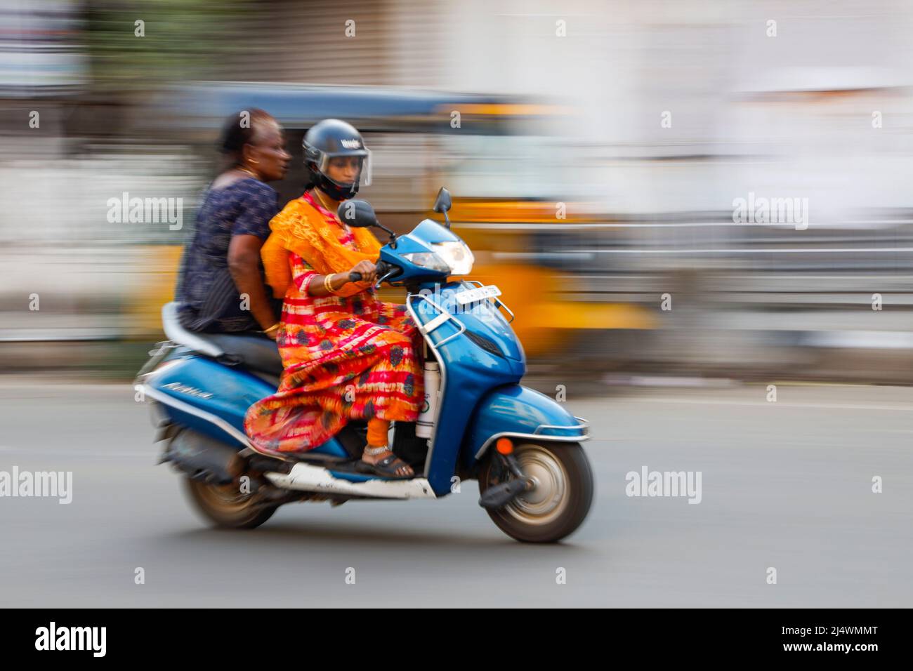 Scooter riding indian women hi-res stock photography and images - Alamy