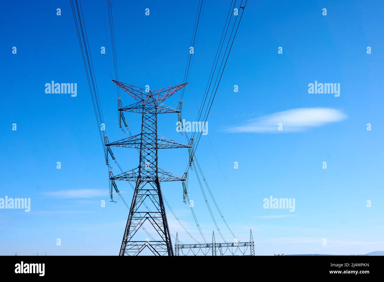 High voltage towers with hanging power lines Stock Photo - Alamy