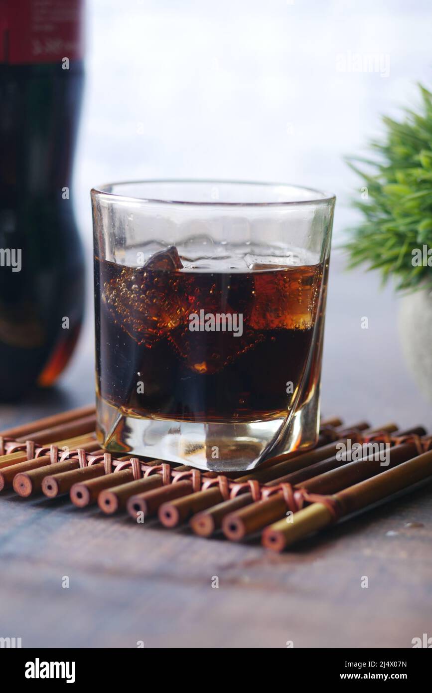 cold soft drinks with ice on table Stock Photo - Alamy