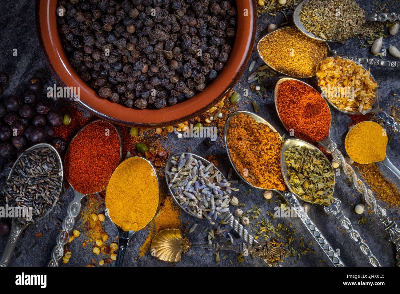 Selection of spices used to add flavor and seasoning to food during ...