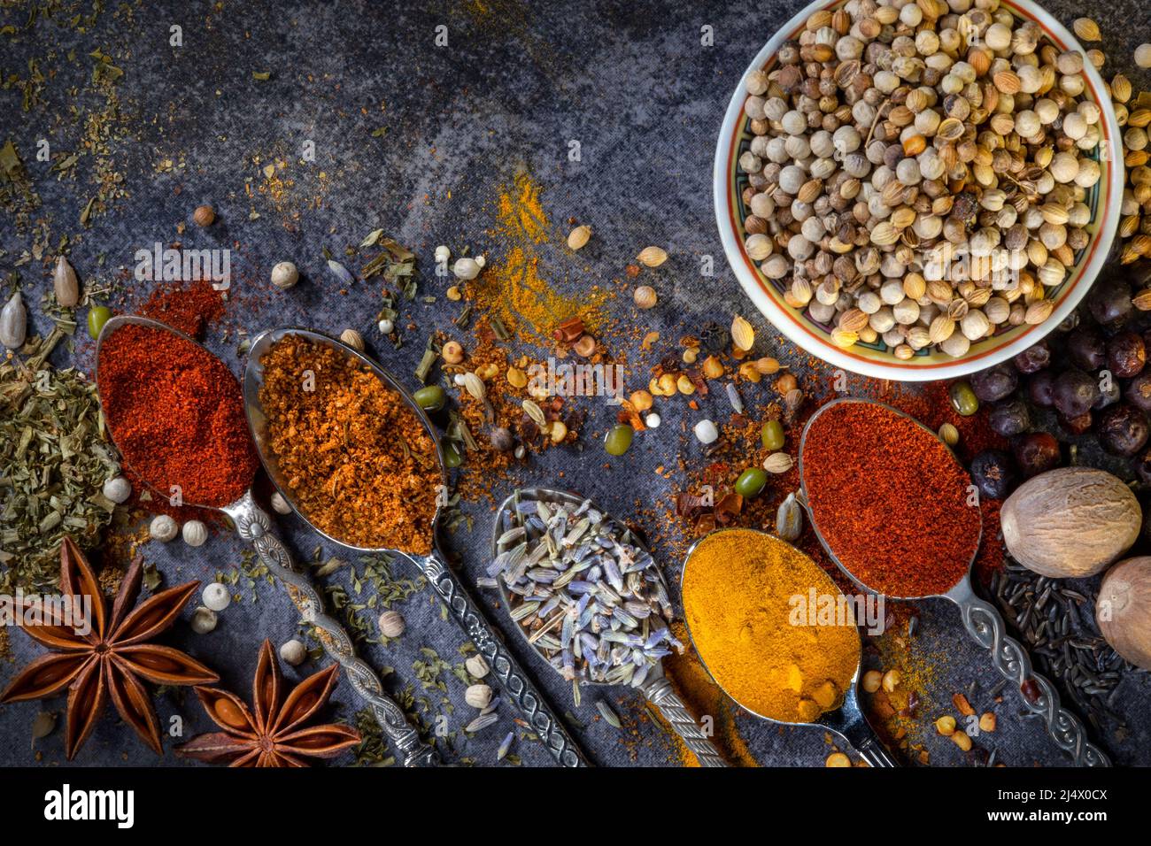 Selection of spices used to add flavor and seasoning to food during ...