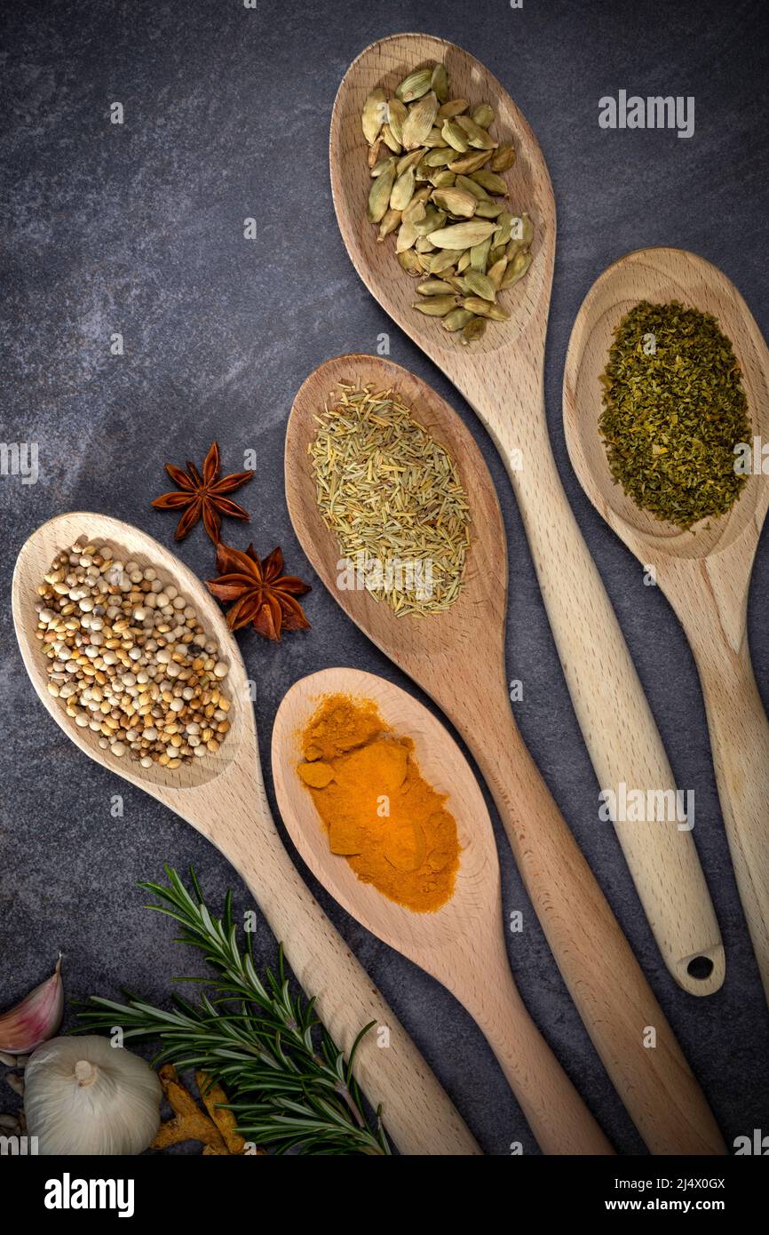 Selection of herbs and cooking spices used to add flavor and seasoning ...