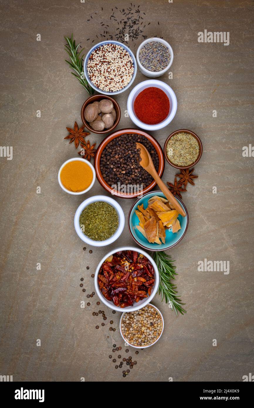 Selection of spices used to add flavor and seasoning to food during ...