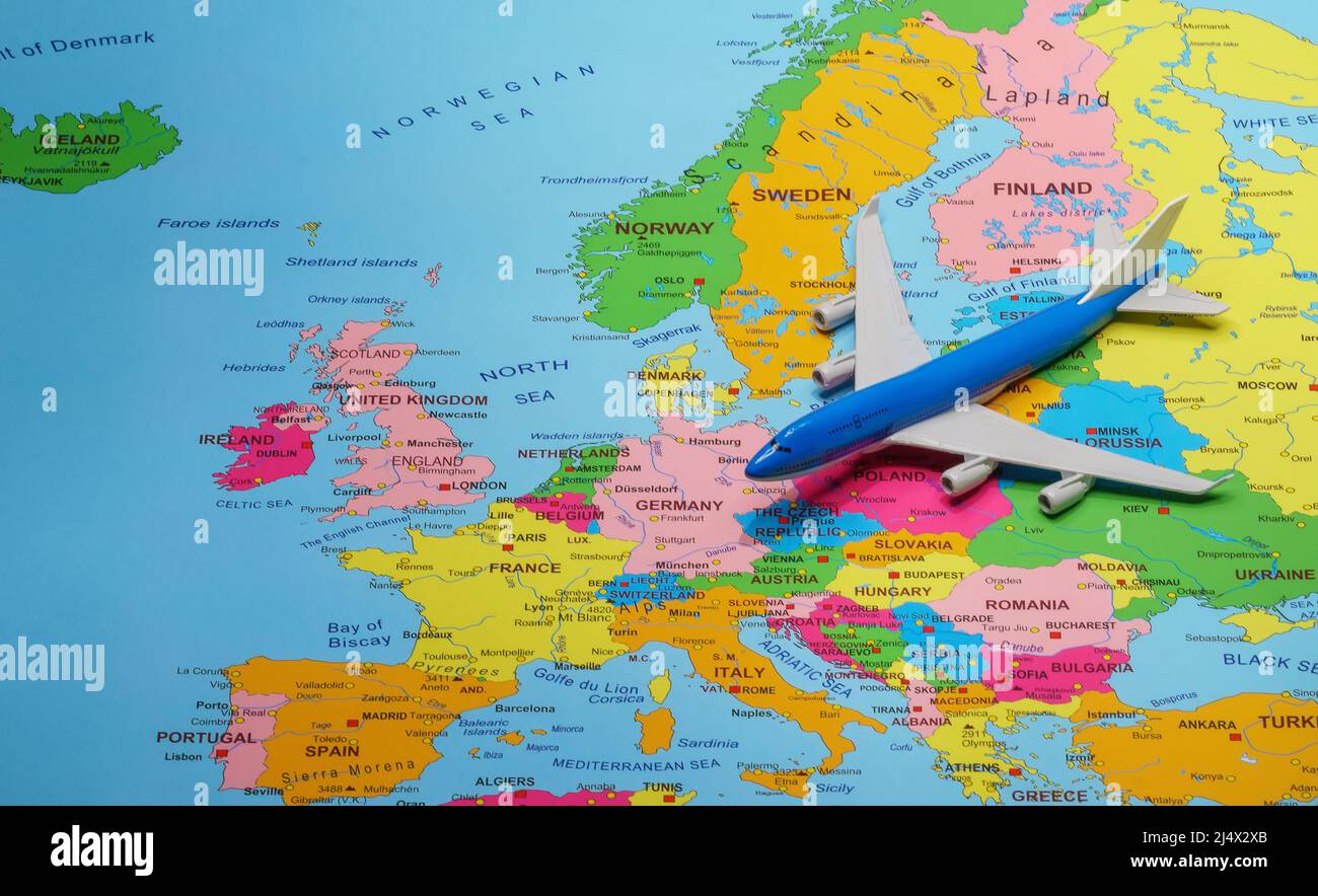 Air travel concept. Toy airplane model on the map of Europe Stock Photo ...