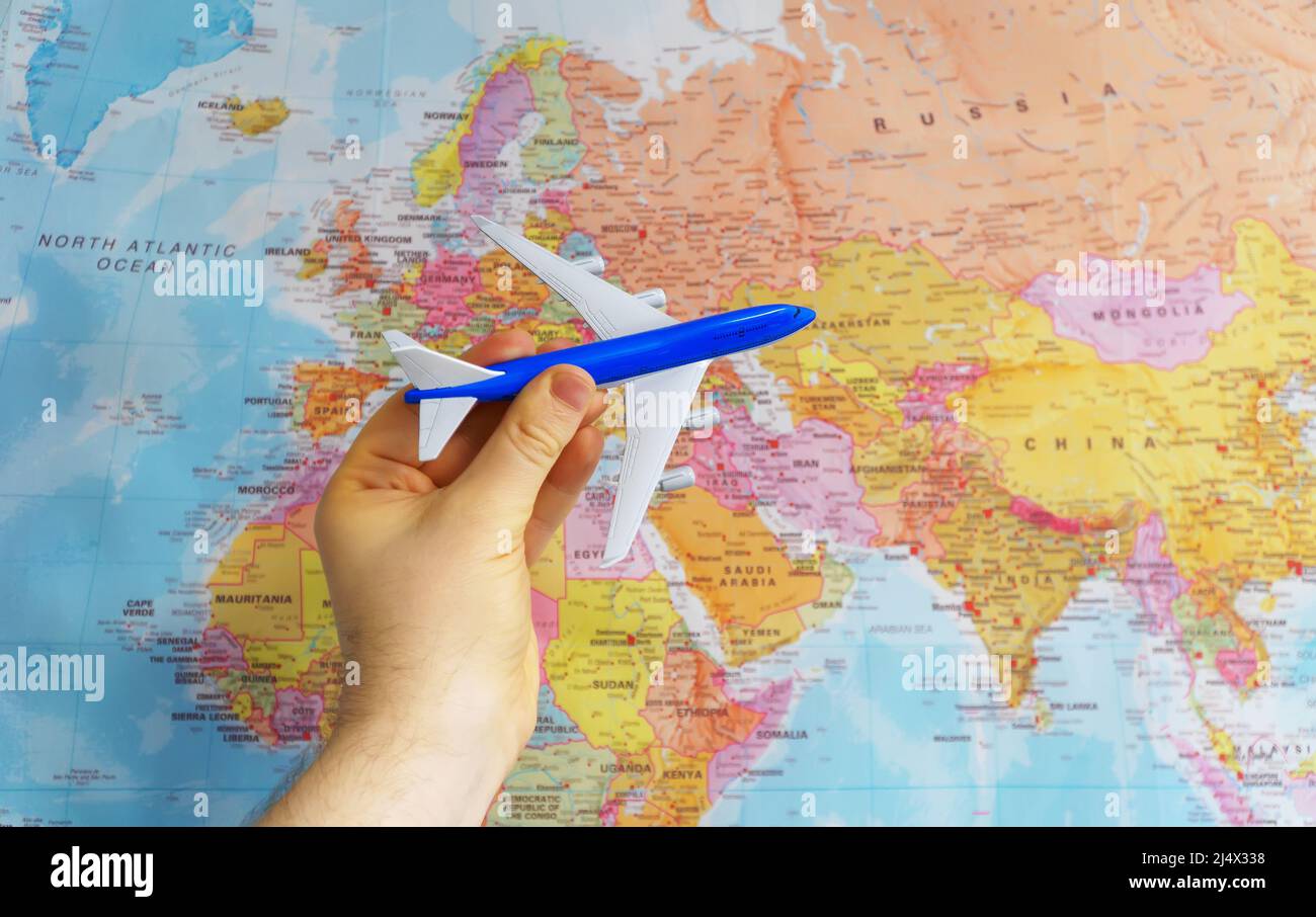 Flights over Europe concept. Model aircraft over map Stock Photo - Alamy