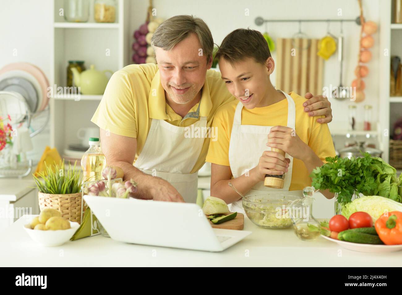 Boy cooking hi-res stock photography and images - Alamy
