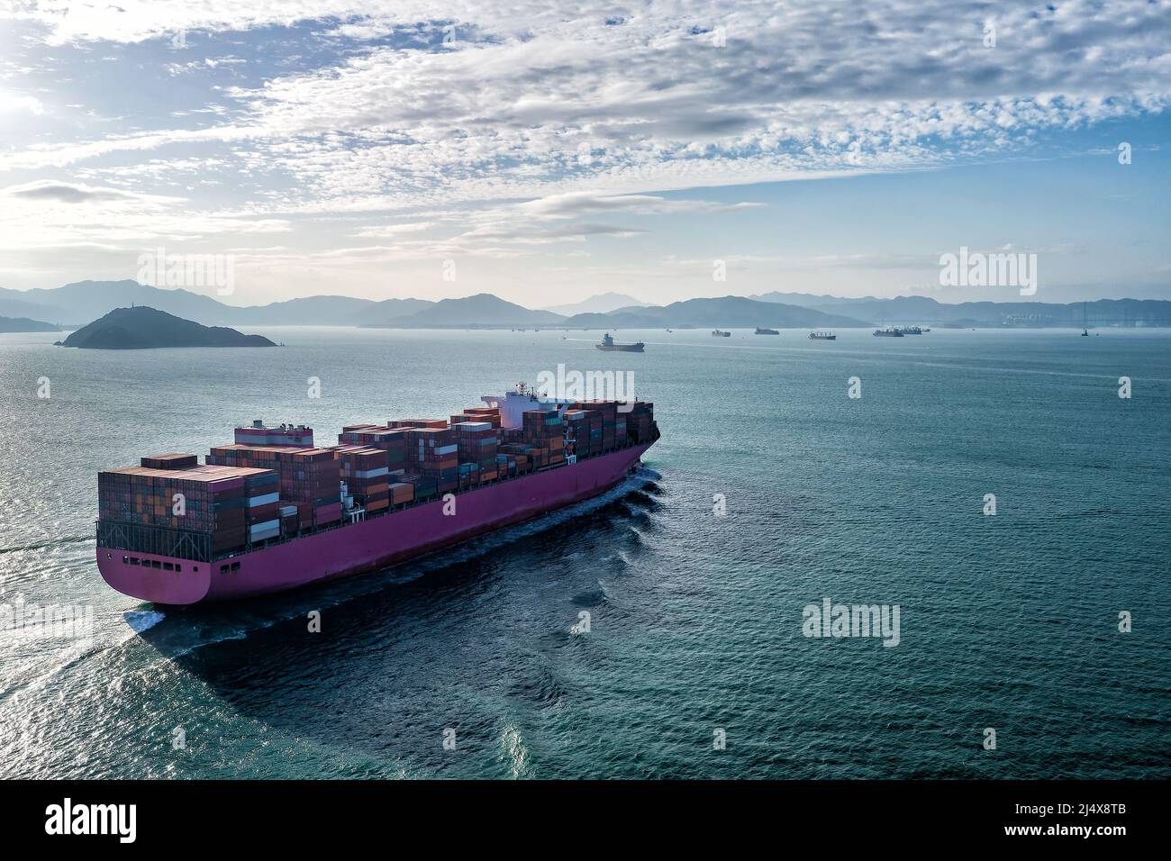 Aerial view of fully loaded container ship arriving Hong Kong Stock ...