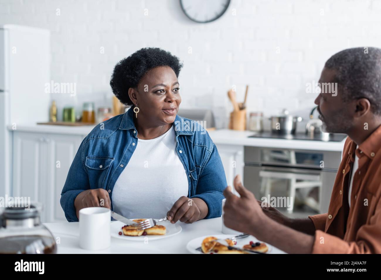 senior african american couple talking during breakfast Stock Photo - Alamy