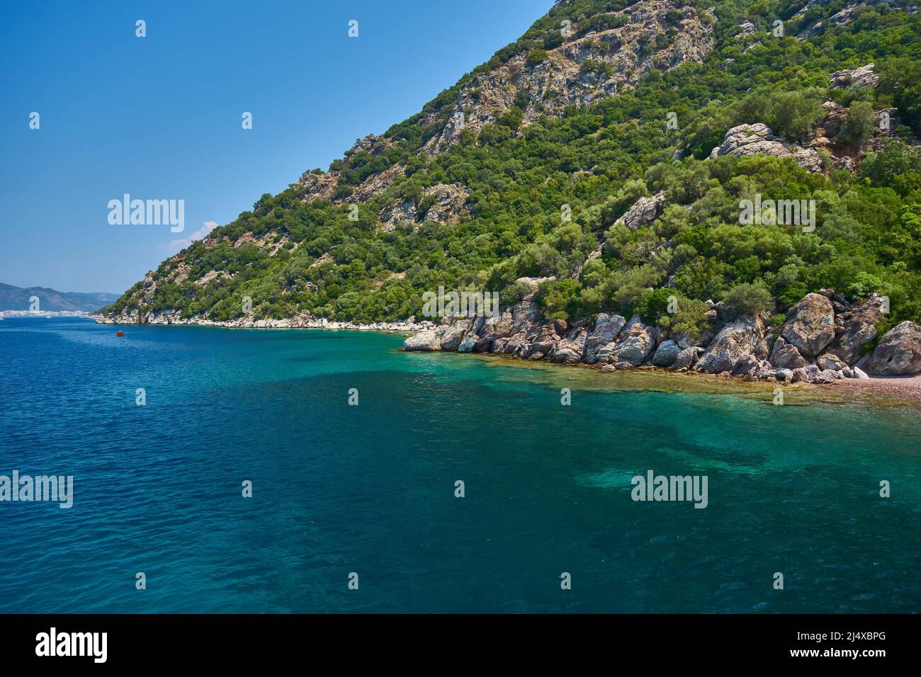 Camellia island near Marmaris in Aegean Sea, blue lagoon and rocky ...