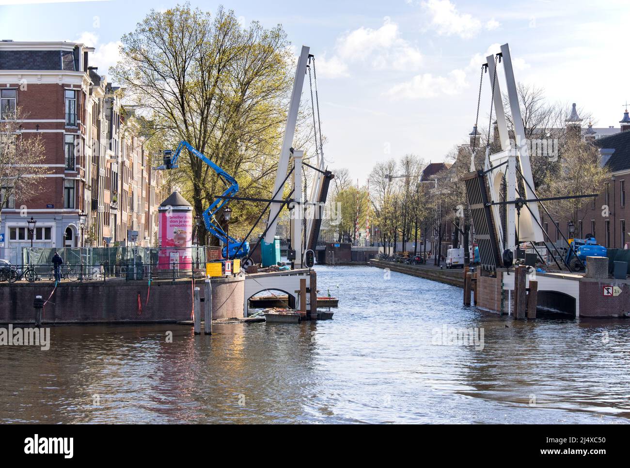 the magere lifting bridge or skinny bridge over the river amstel in ...