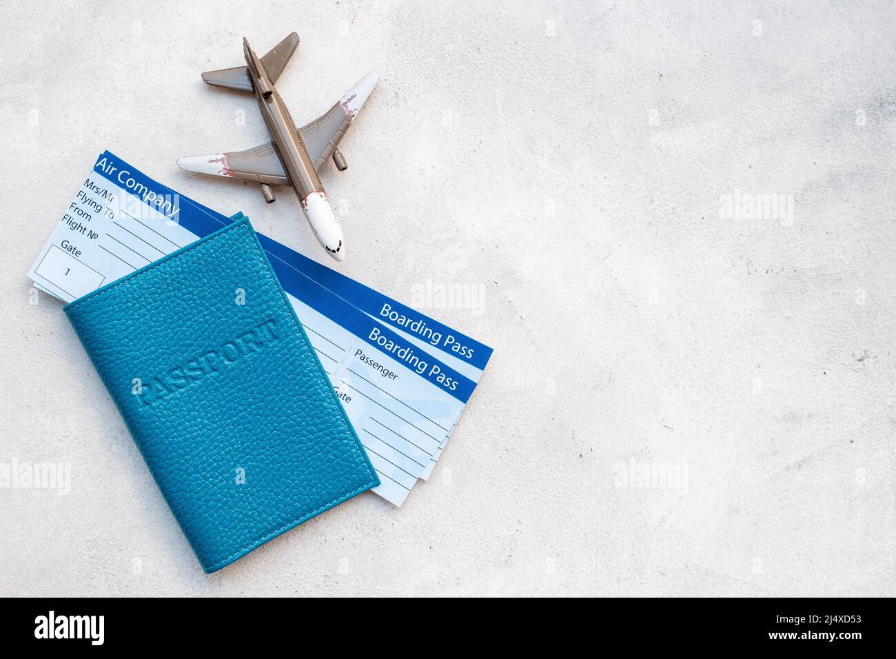 Airplane ticket with passport. Immigration concept Stock Photo - Alamy