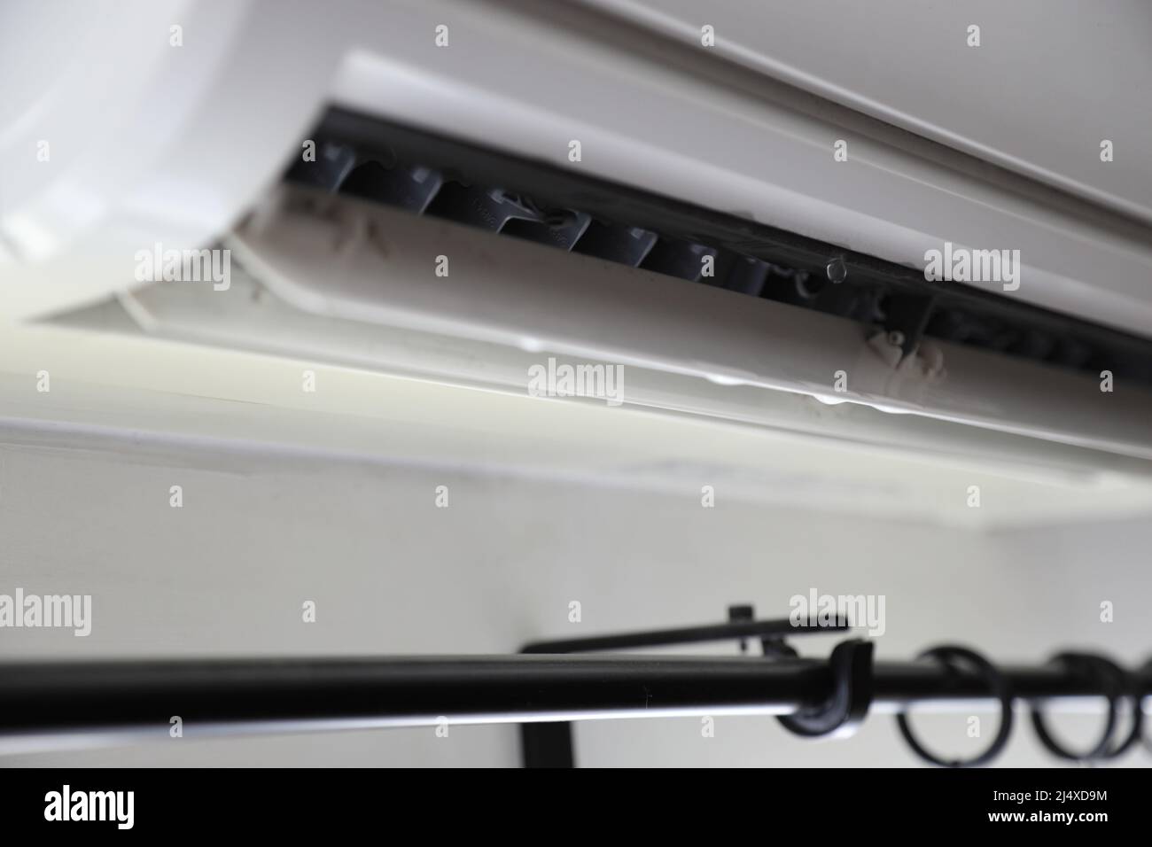 The liquid leaked from the broken air conditioner Stock Photo - Alamy