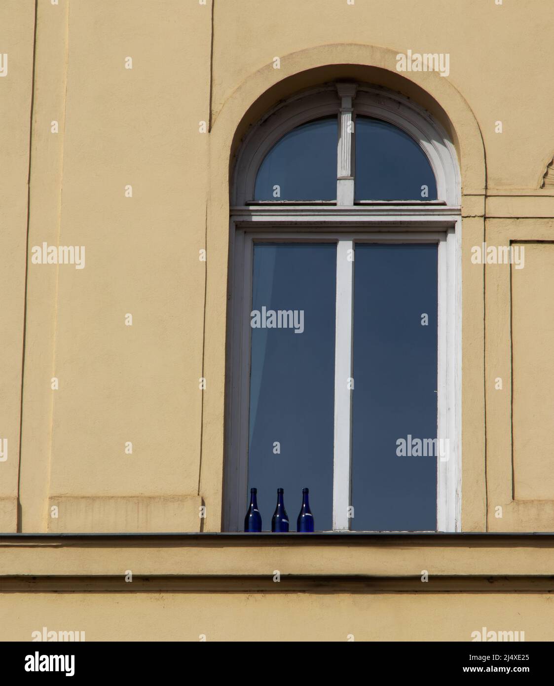 strange blue bottles outside the window of the house Stock Photo - Alamy