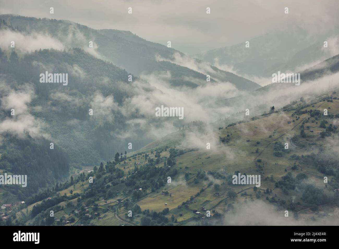Majestic view on beautiful fog mountains in mist landscape. Dramatic ...