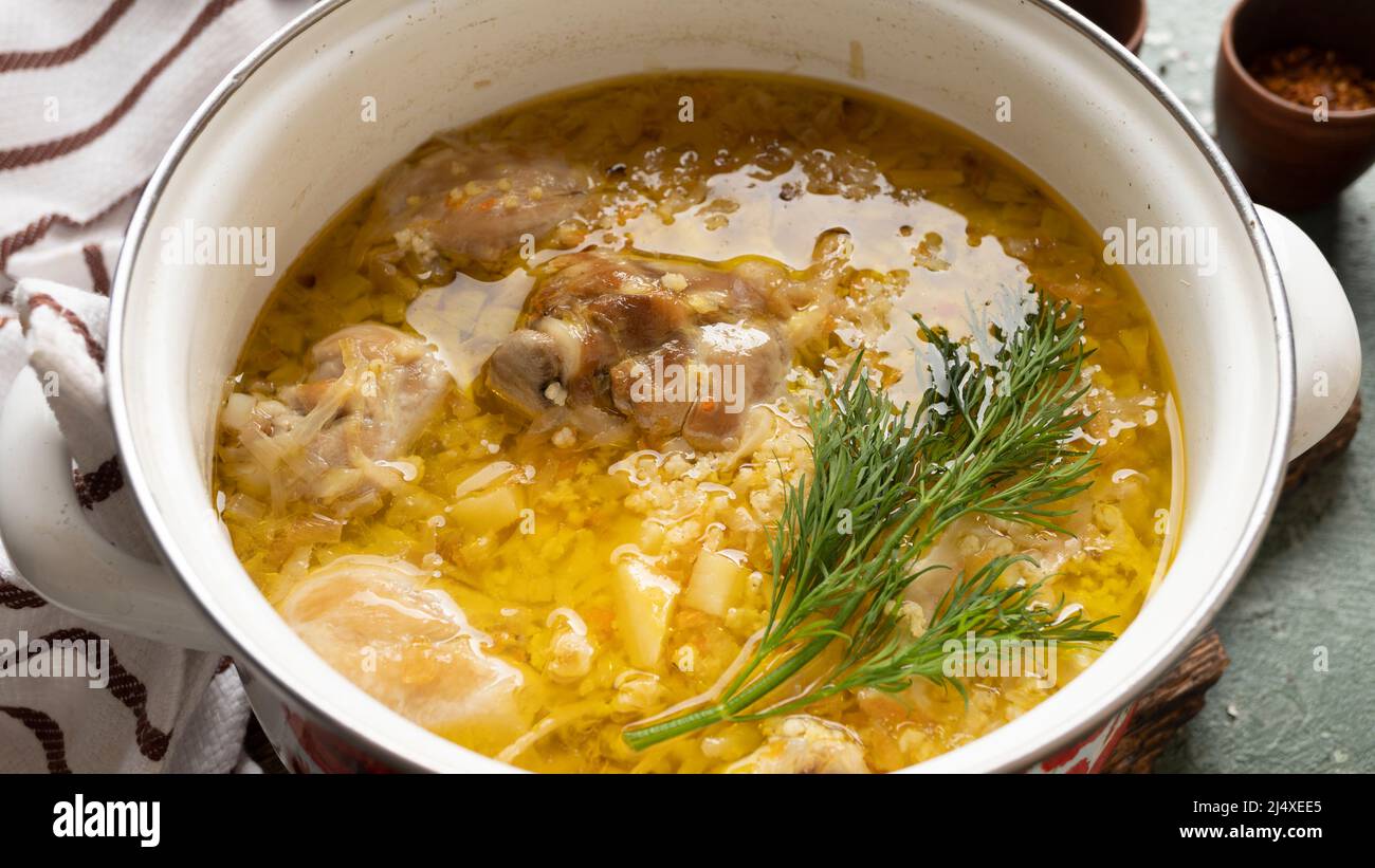 Delicious german soup eintopf with chicken and sauerkraut on the dinner ...