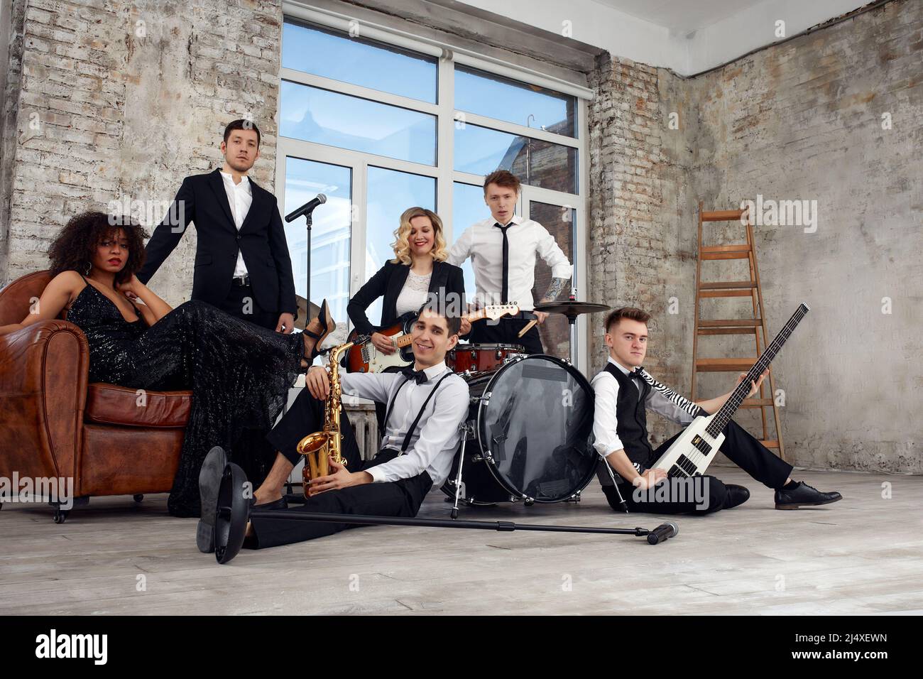 Young international musicians, a band performing on the loft stage. The ...