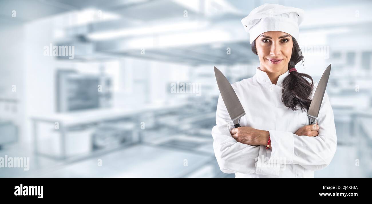 Happy female chef arms crossed hi-res stock photography and images - Alamy