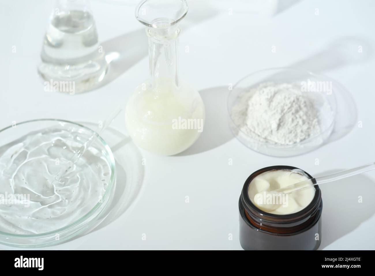laboratory dishes and glassware on a lab table. fermentation, fermented ...