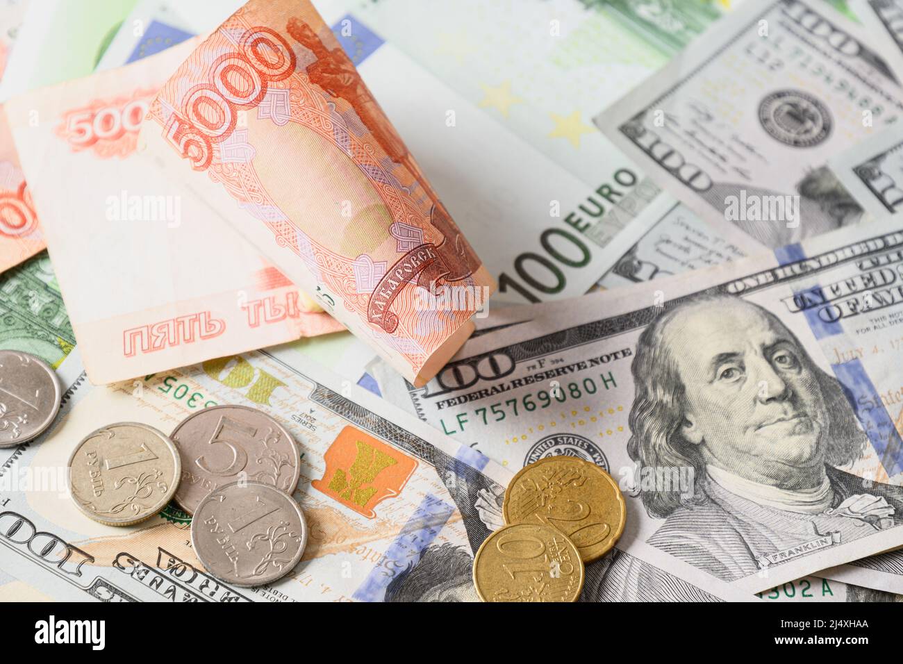 Paper money banknotes of 100 euro, 100 american dollars, swirl Russian ...