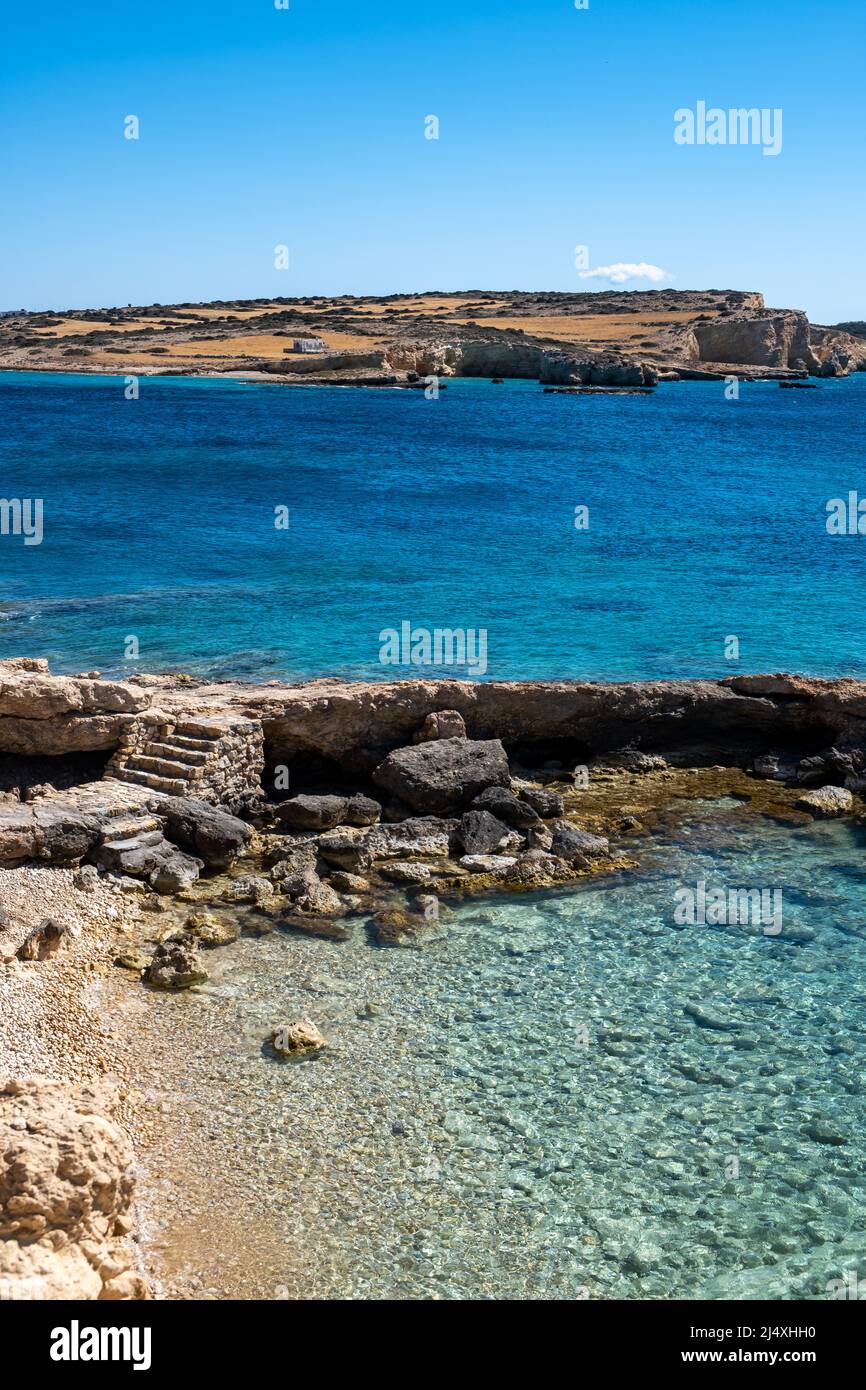 Koufonisia island, Cyclades, Greece. Stone stairs going to a rocky ...