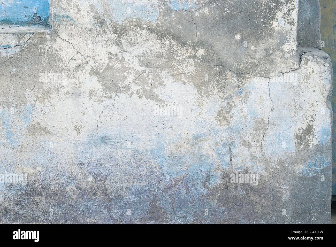 Old flaky wall with destroyed plaster. Renovation of old house ...