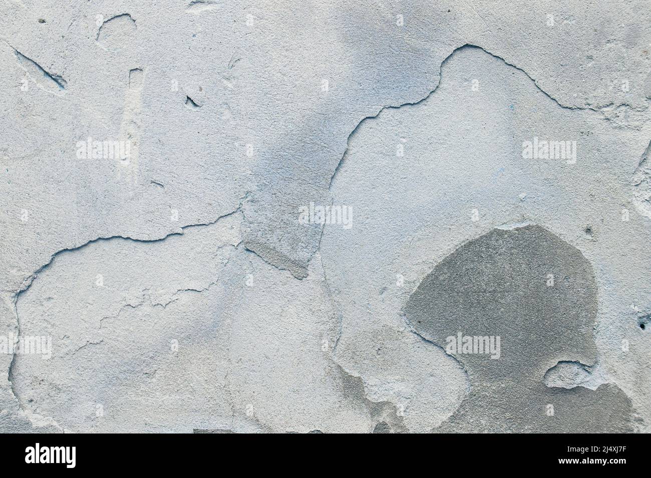 Old flaky wall with destroyed plaster. Renovation of old house ...