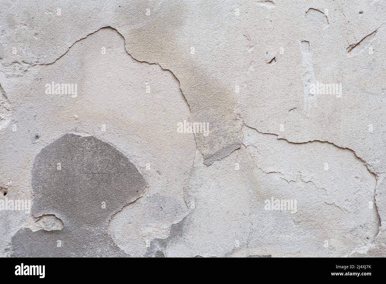Old flaky wall with destroyed plaster. Renovation of old house ...