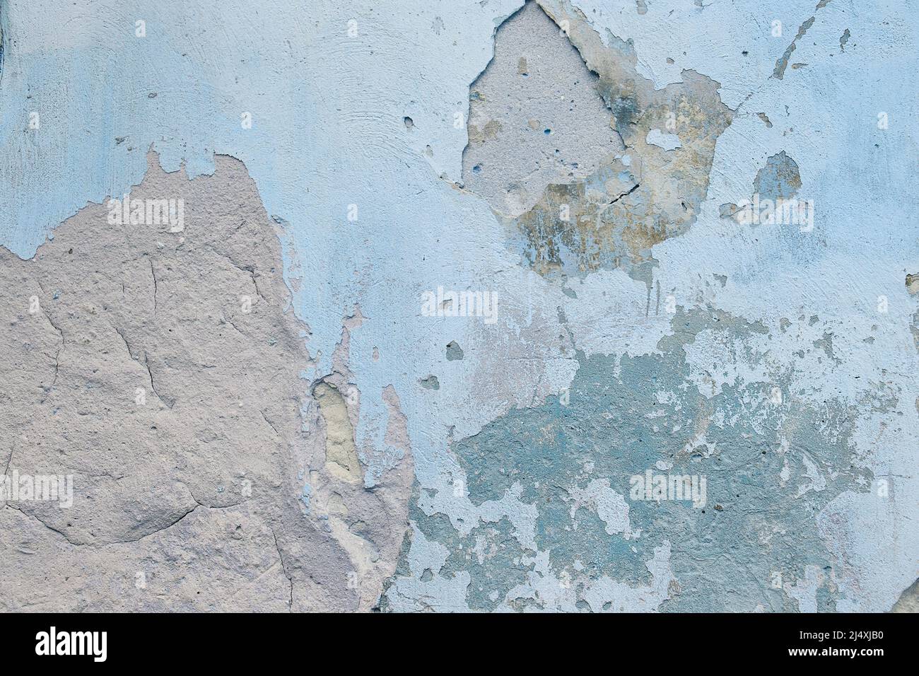 Old flaky wall with destroyed plaster. Renovation of old house ...