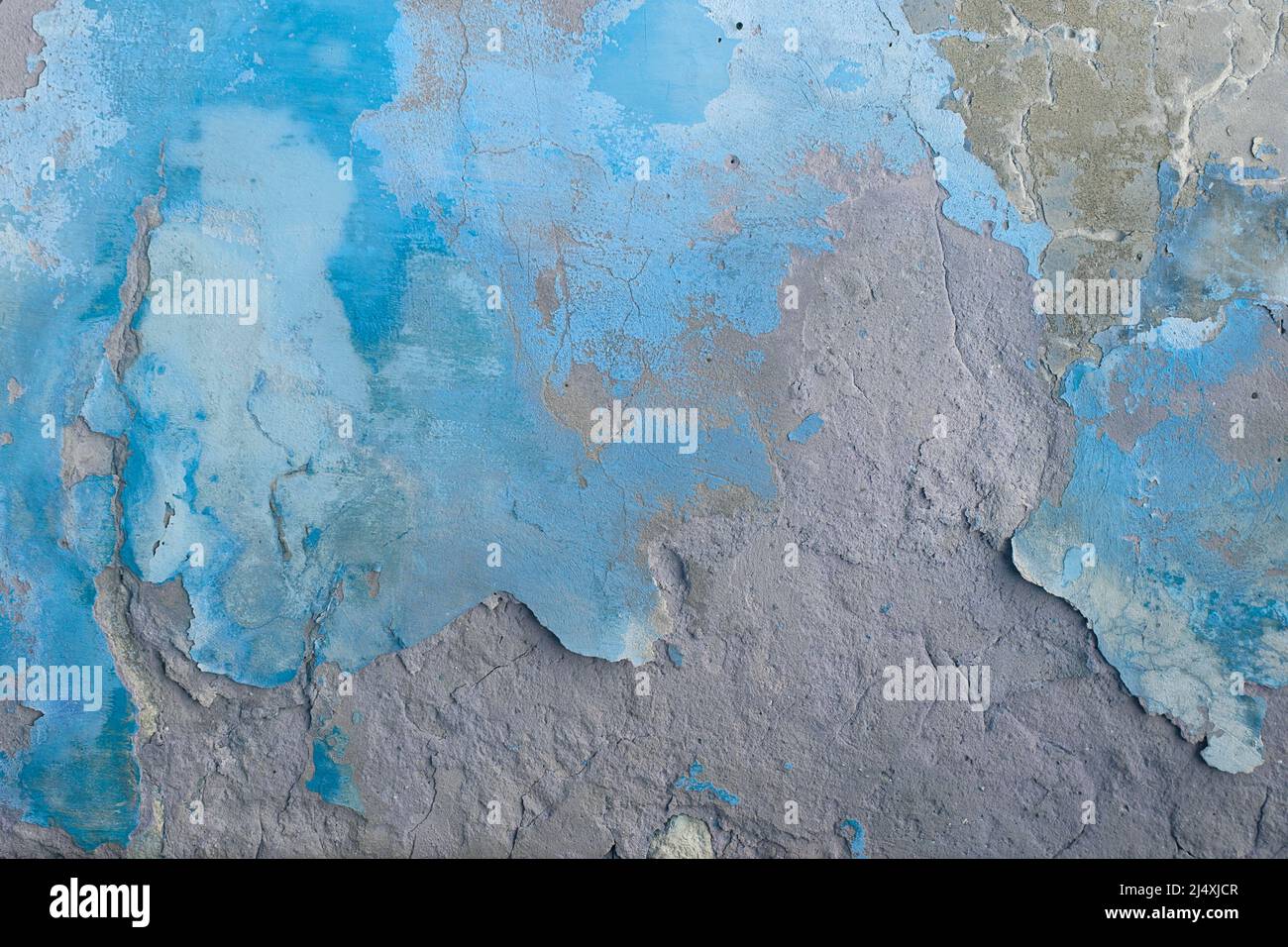 Old flaky wall with destroyed plaster. Renovation of old house ...