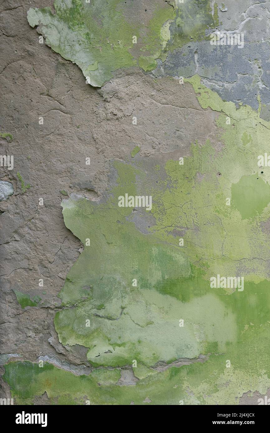 Old flaky wall with destroyed plaster. Renovation of old house ...