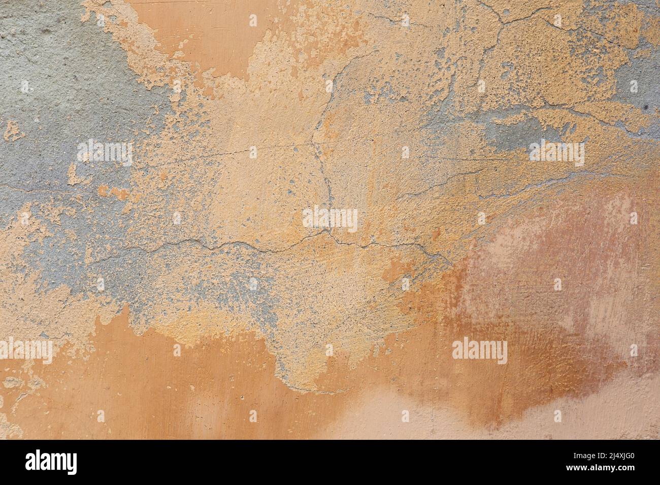 Old flaky wall with destroyed plaster. Renovation of old house ...