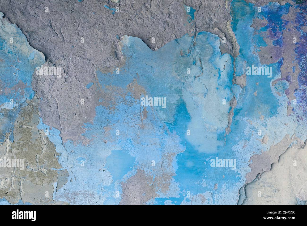 Old flaky wall with destroyed plaster. Renovation of old house ...