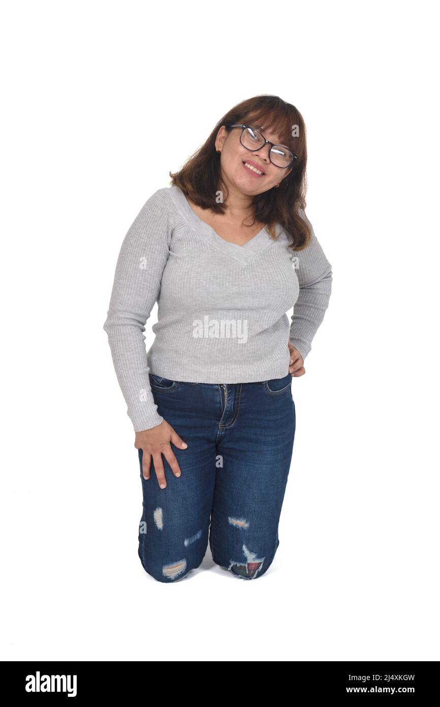 front view of a woman kneeling on white background Stock Photo - Alamy