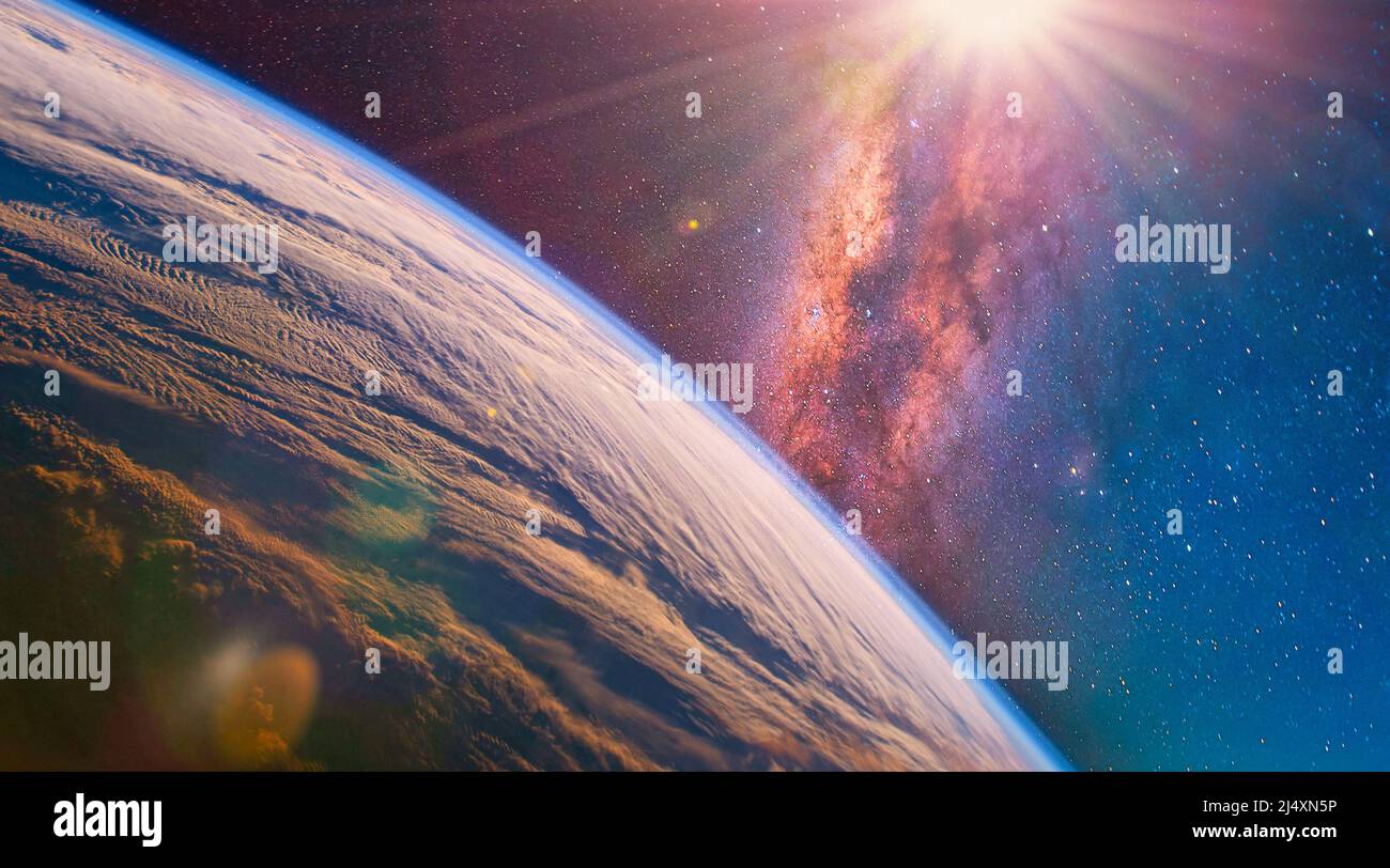 Landscape with Milky way galaxy. Sunrise and Earth view from space with ...