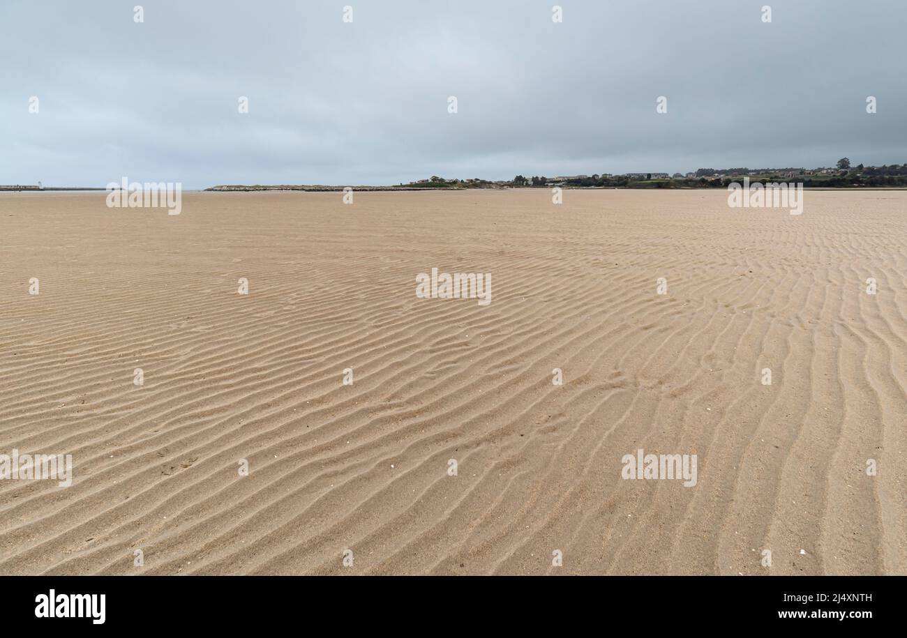 Sand bottom with waves of the low tide in Lugo, Galicia, Spain Stock ...