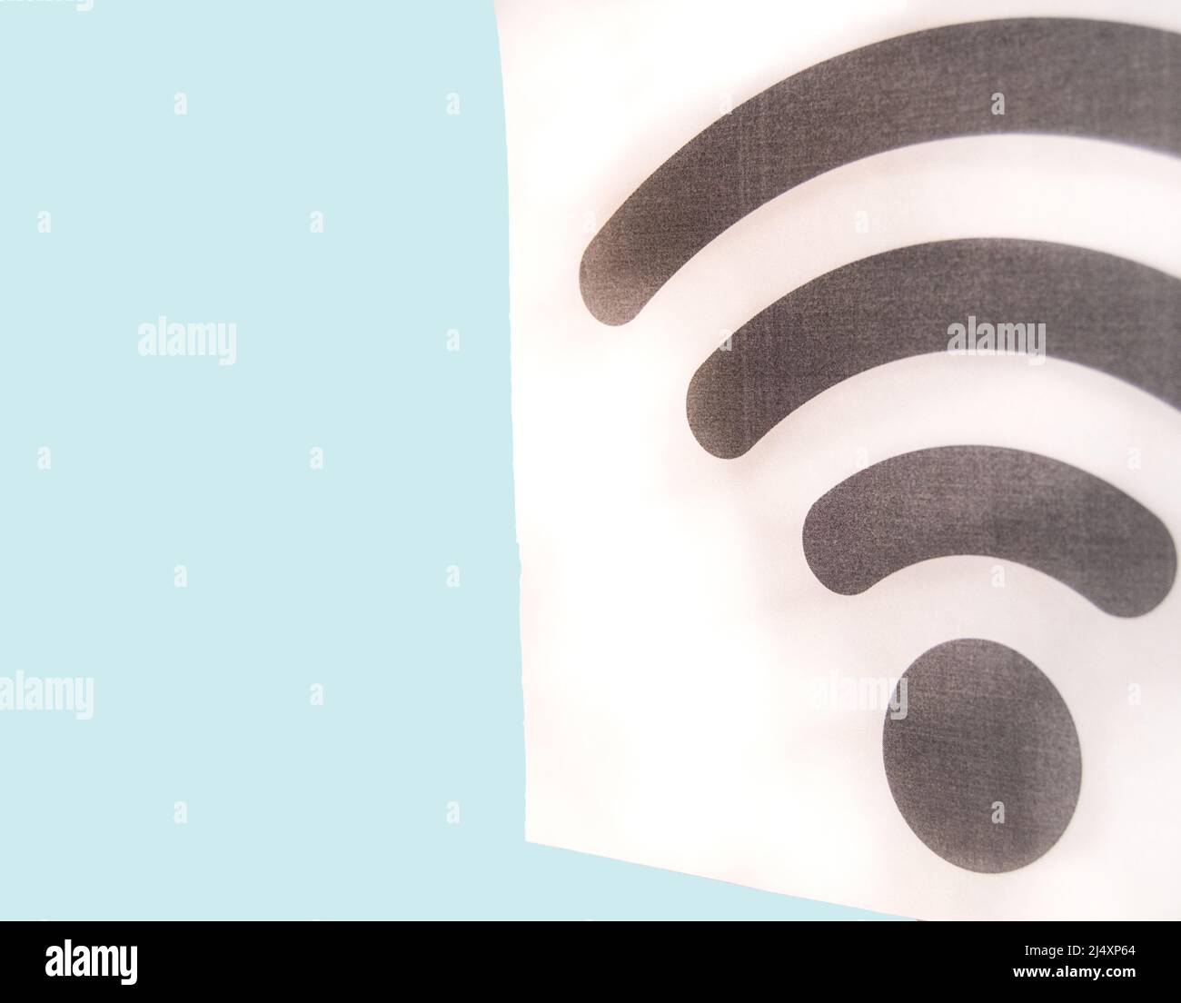 Wireless zone concept. WiFi symbol on the wall with a copy of the space ...