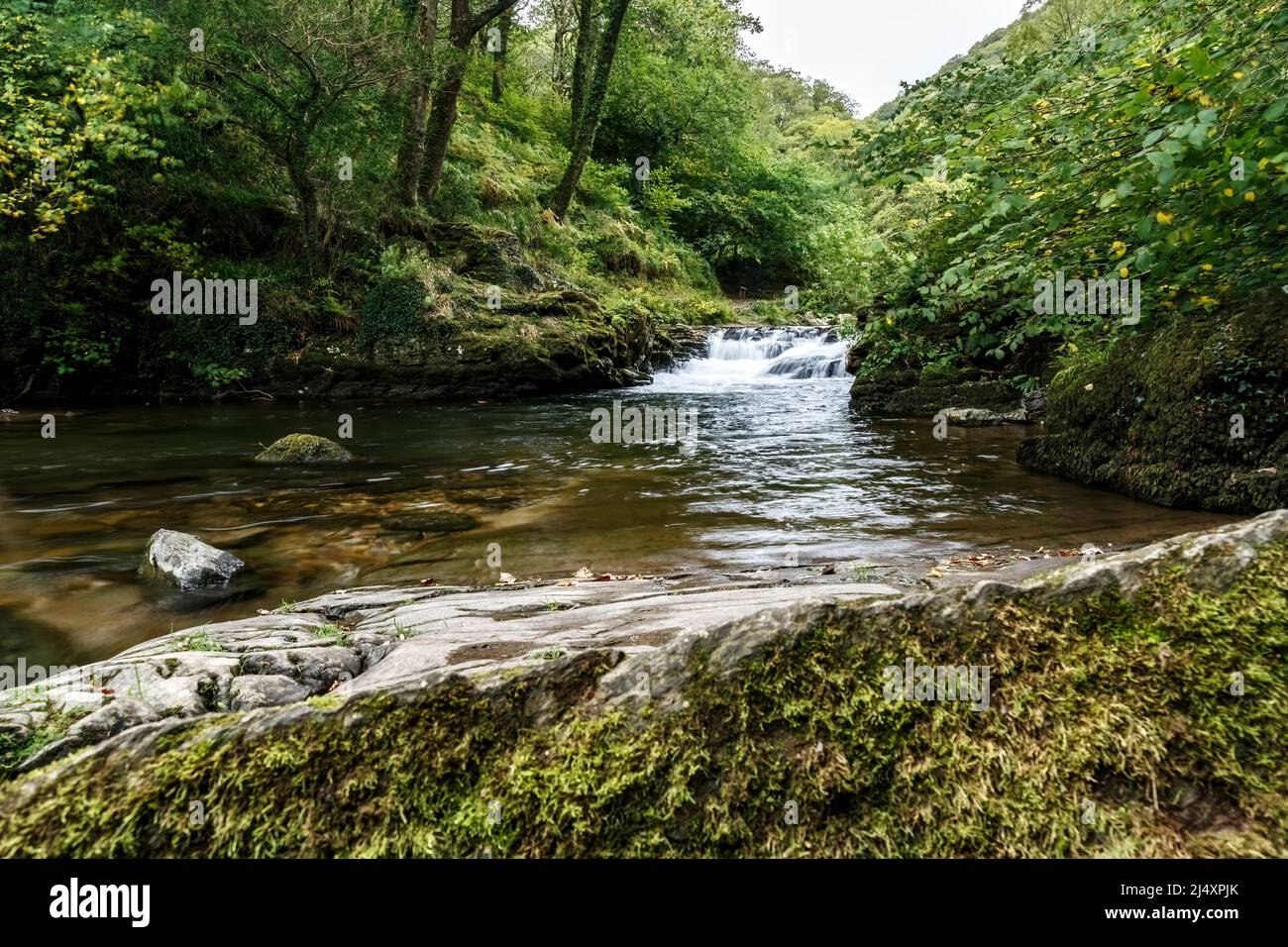 Easy Lyn river flowing over rocks creating waterfalls and rapids with ...
