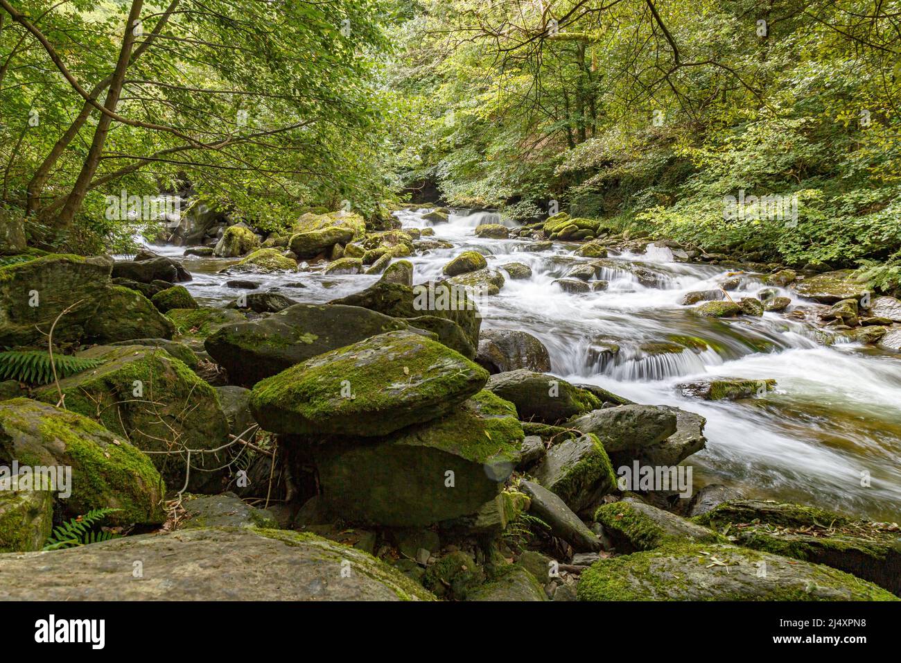 Easy Lyn river flowing over rocks creating waterfalls and rapids with ...