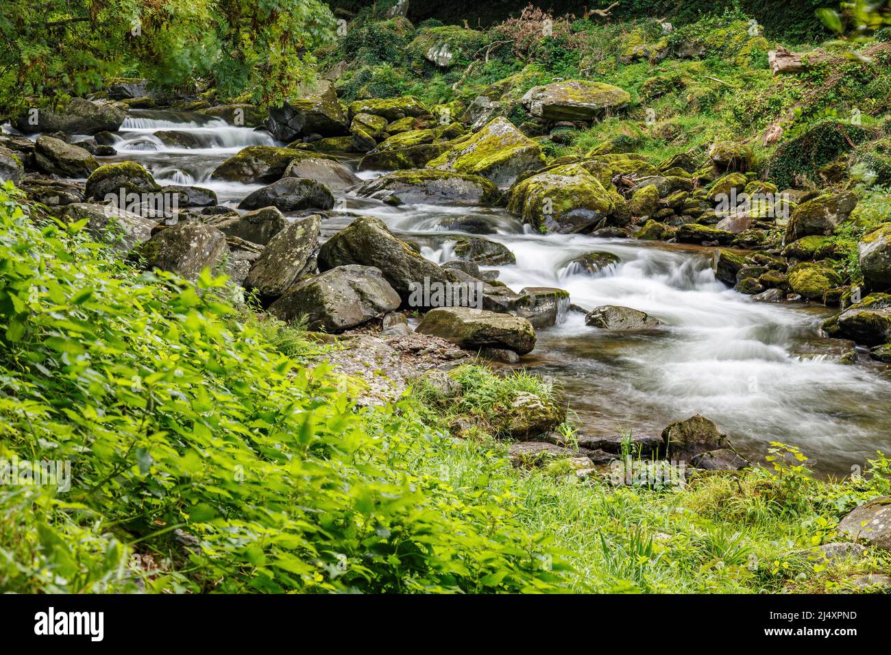 Easy Lyn river flowing over rocks creating waterfalls and rapids with ...
