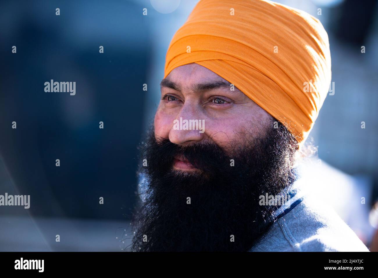 A man wearing a head scarf attends the Vaisakhi Festival held in ...