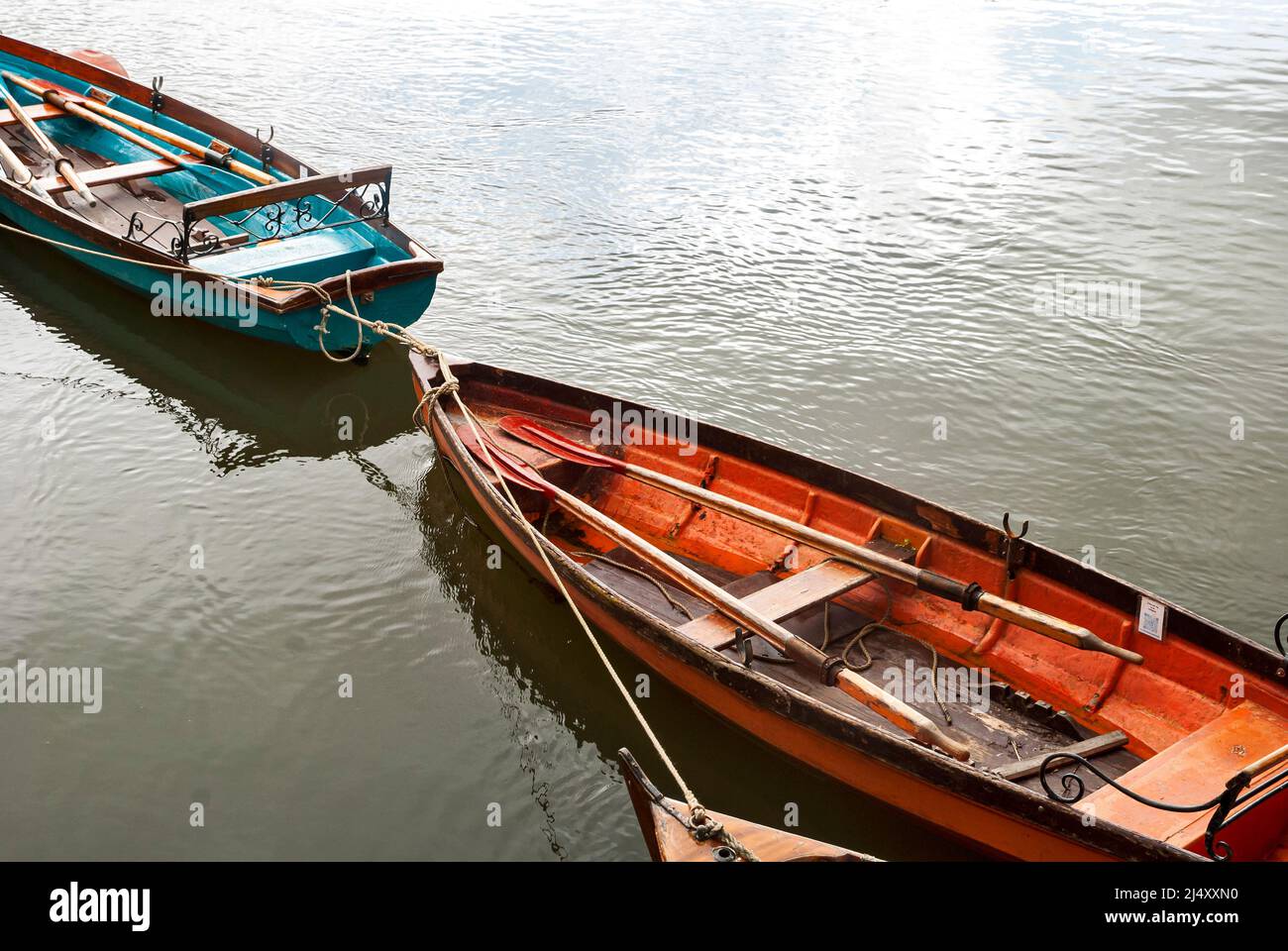 Punt flat bottom river wooden boats on river Thames waters in Richmond ...