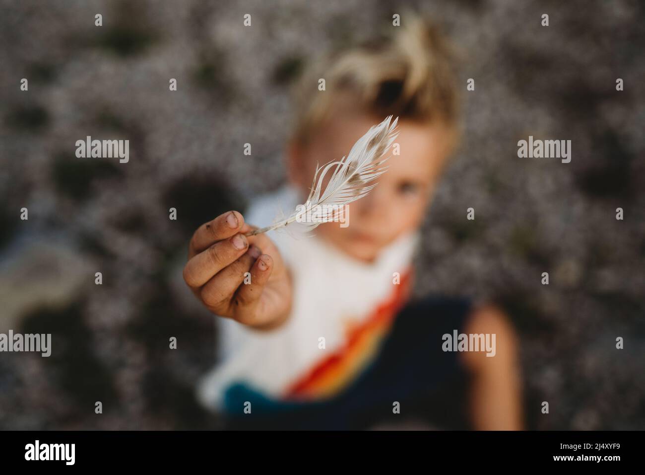 Children throwing stones hi-res stock photography and images - Alamy