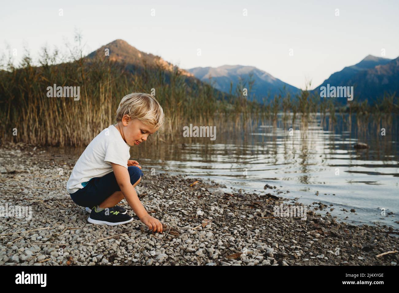 Children throwing stones hi-res stock photography and images - Alamy