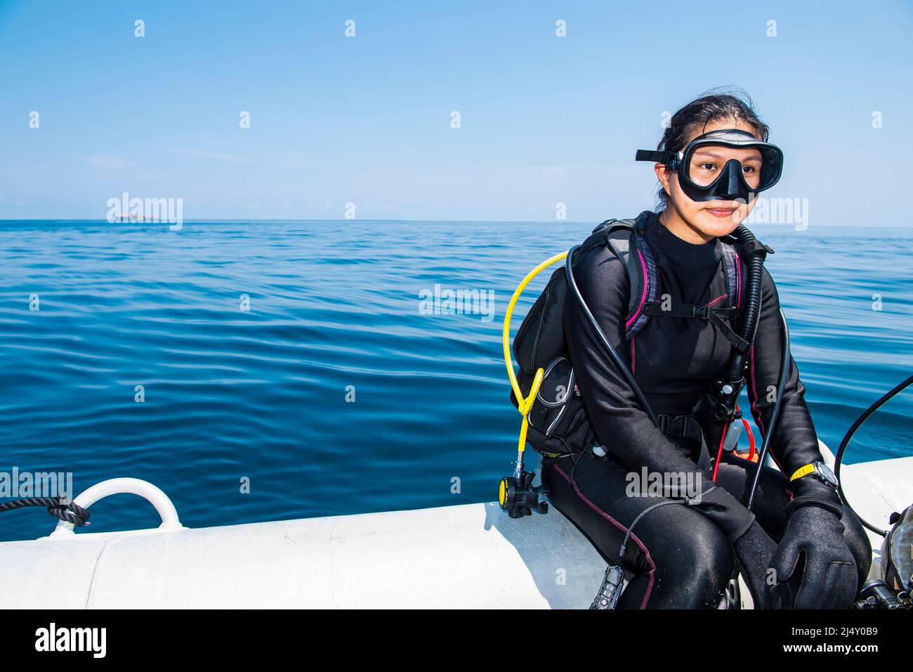 woman getting ready for a dive at Komodo Island Stock Photo - Alamy